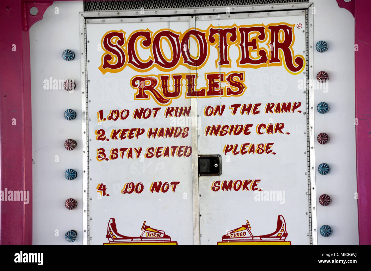 rules for using a carnival ride called a scooter Stock Photo - Alamy