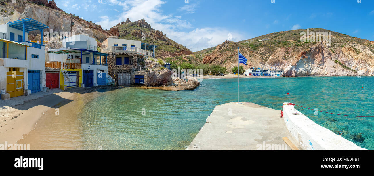 Fishing port and a beach with amazing blue water in Firopotamos Bay ...