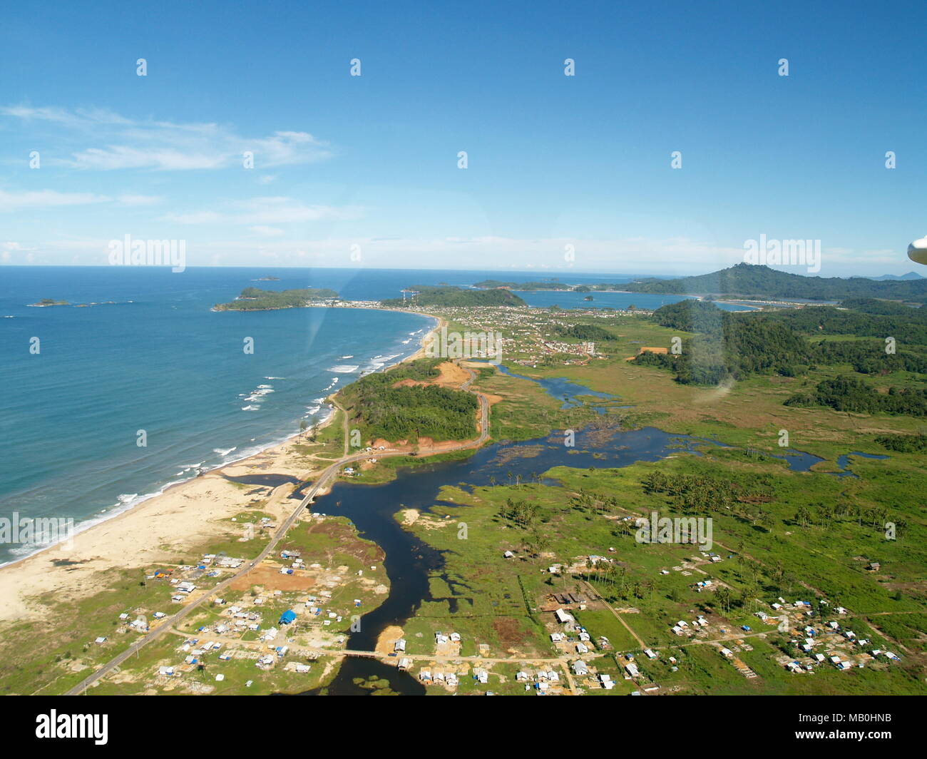 Aerial view of Indian Ocean and Aceh Jaya land from airplane Stock ...