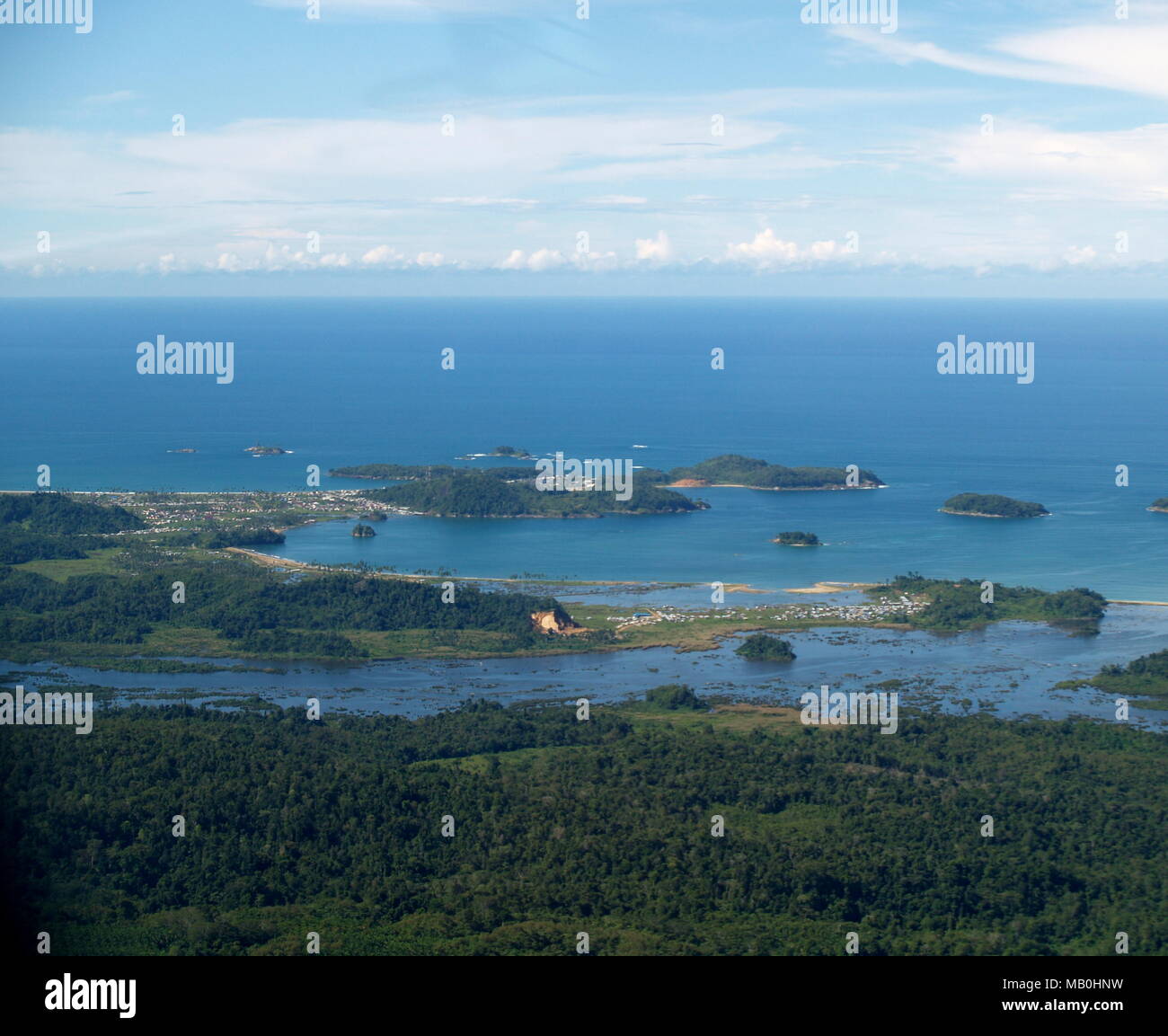 Aerial view of Indian Ocean and Aceh Jaya land from airplane Stock ...