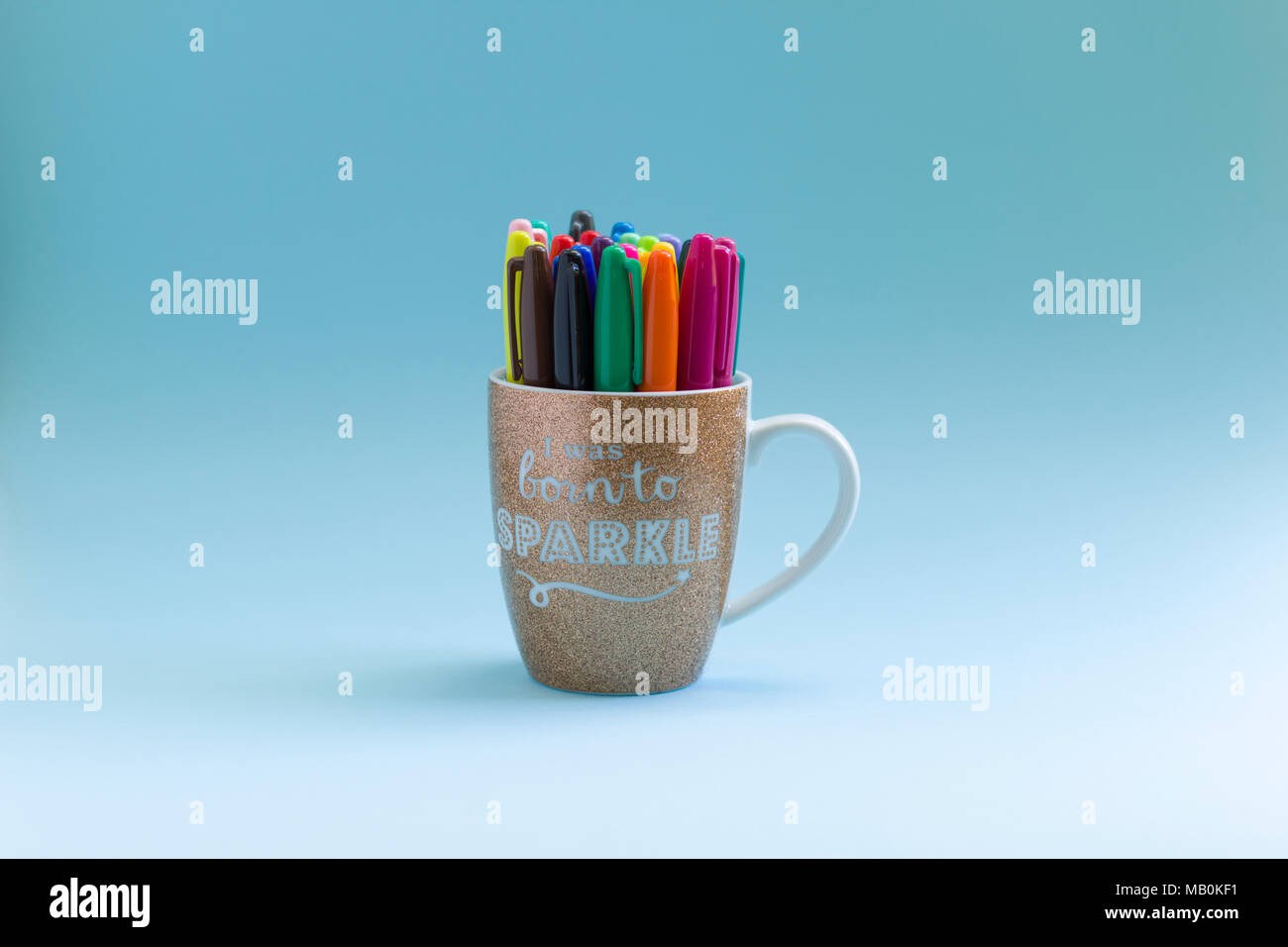Colourful Pens in a cup Stock Photo - Alamy