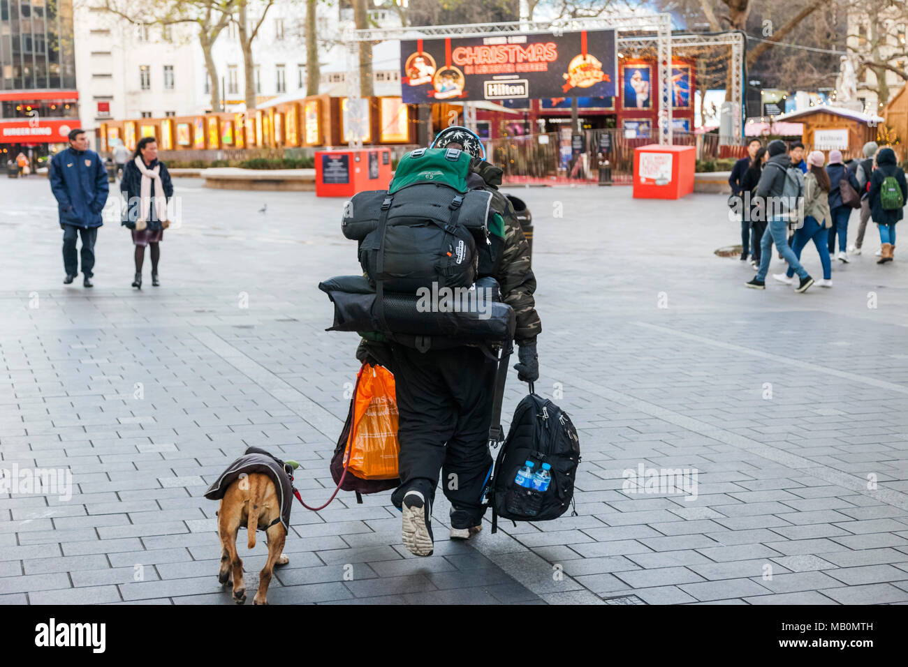 Homeless man with dog hi-res stock photography and images - Alamy