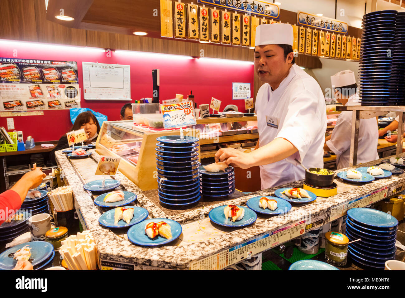 Moving sushi restaurant hi-res stock photography and images - Alamy