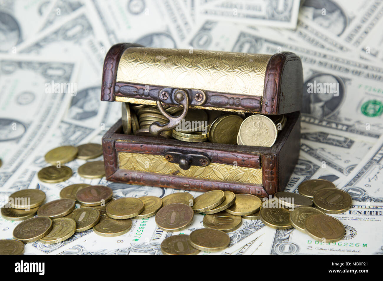 Chest full of jewelry of metal coins and other treasures Stock Photo ...