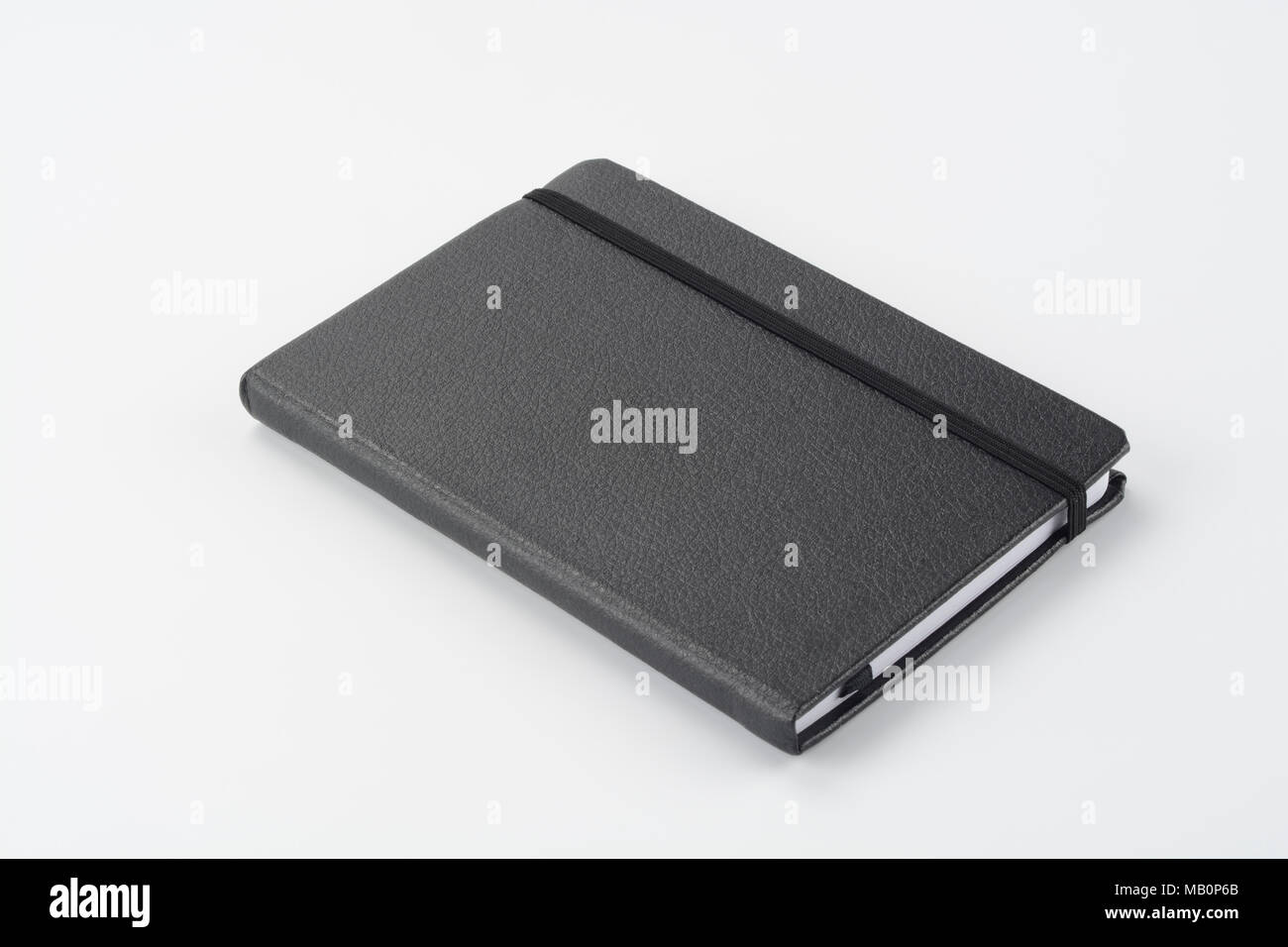 Black notepad with rubber on white background Stock Photo - Alamy