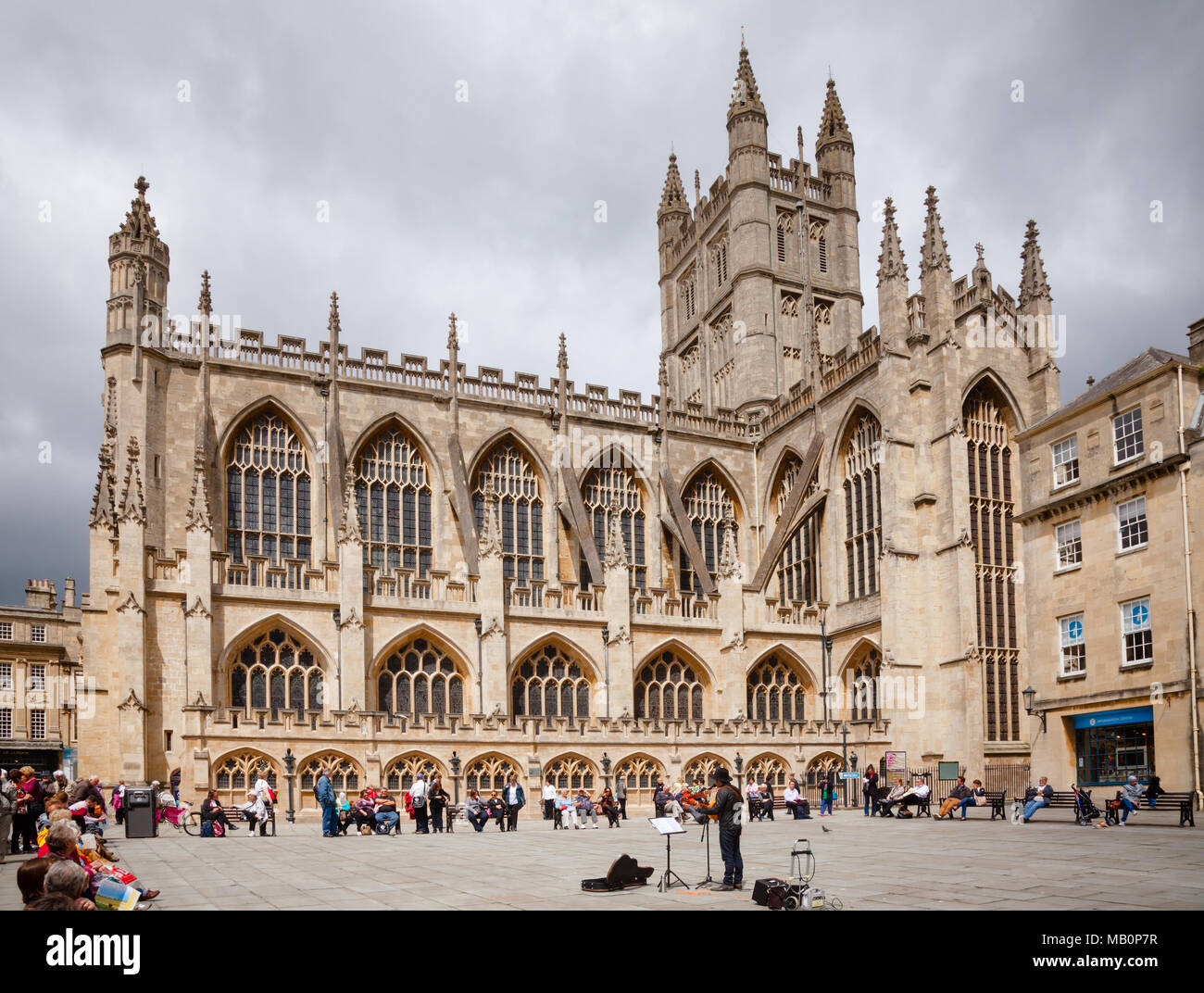BATH, UK - JUN 11, 2013: Street musician buskin at the Abbey Church of ...