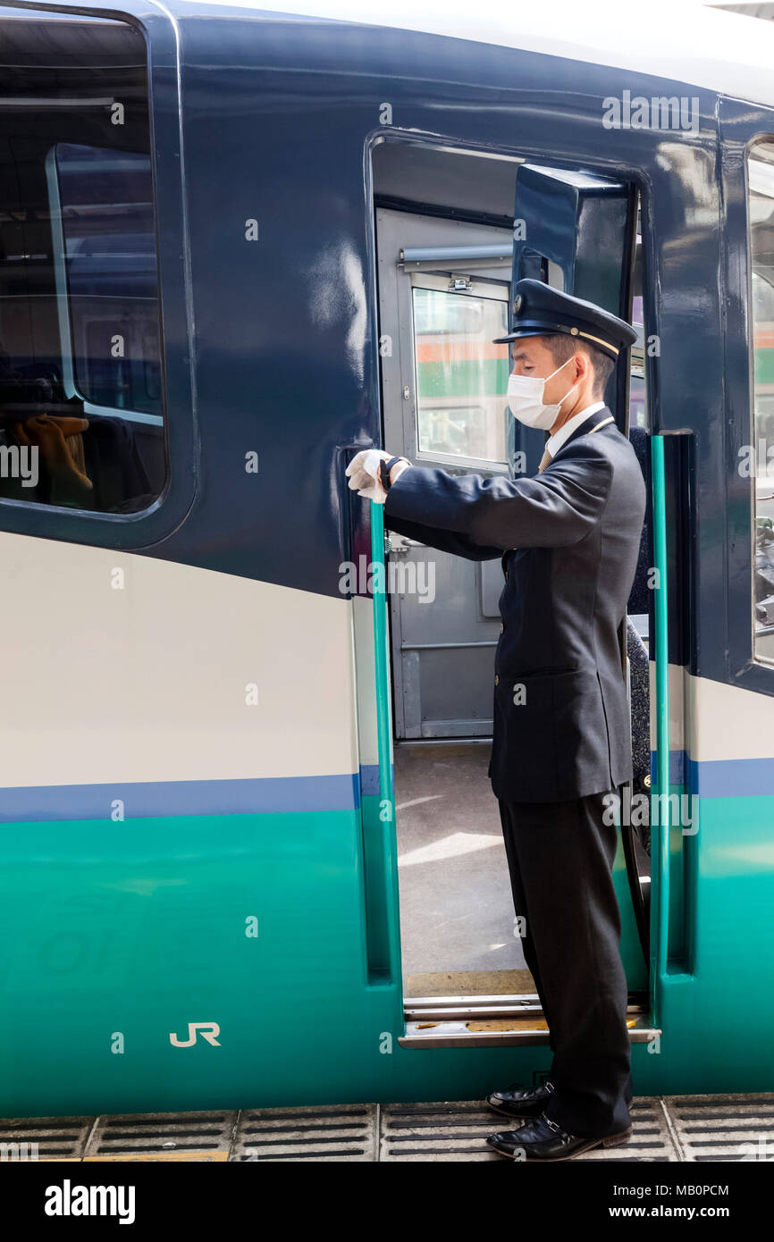 Japan, Honshu, Tokyo, Shinjuku, Shinjuku Train Station, Train Guard ...