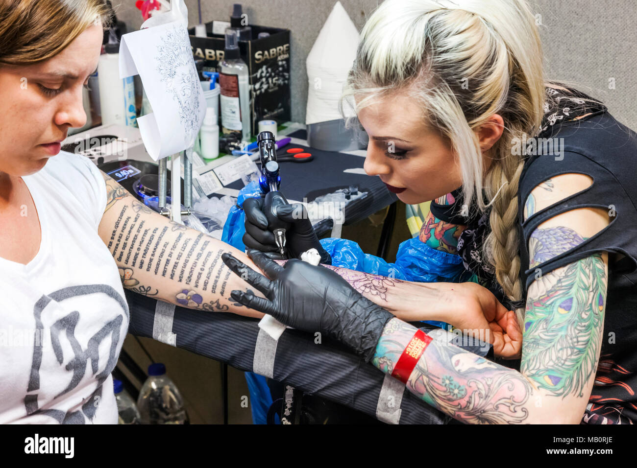England, London, London Tattoo Convention, Tattooist at Work Stock ...
