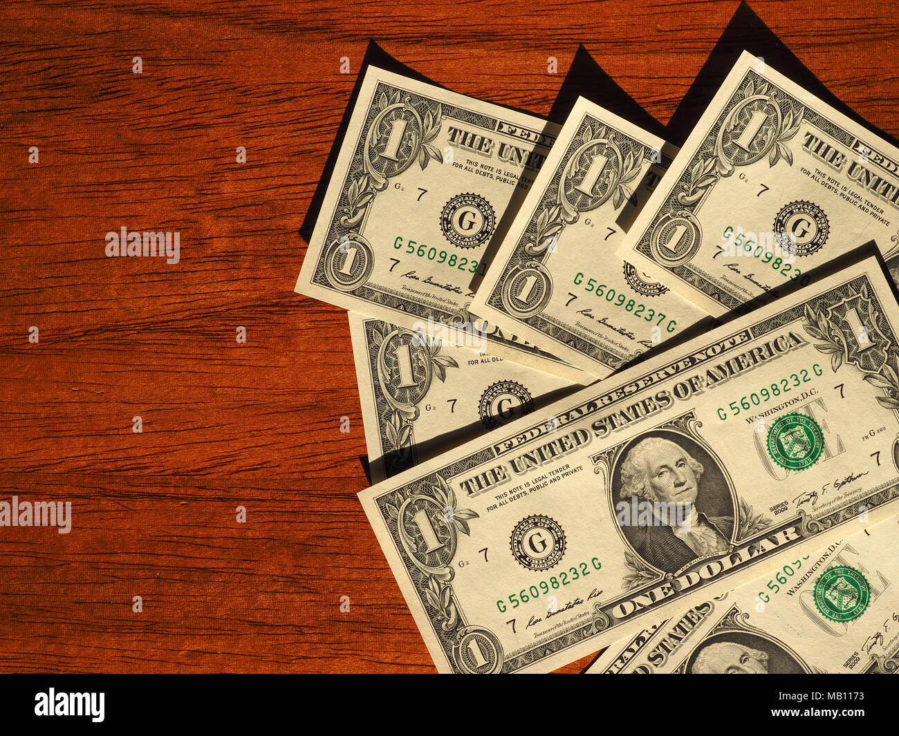 Dollar banknotes money (USD), currency of United States on wooden desk ...