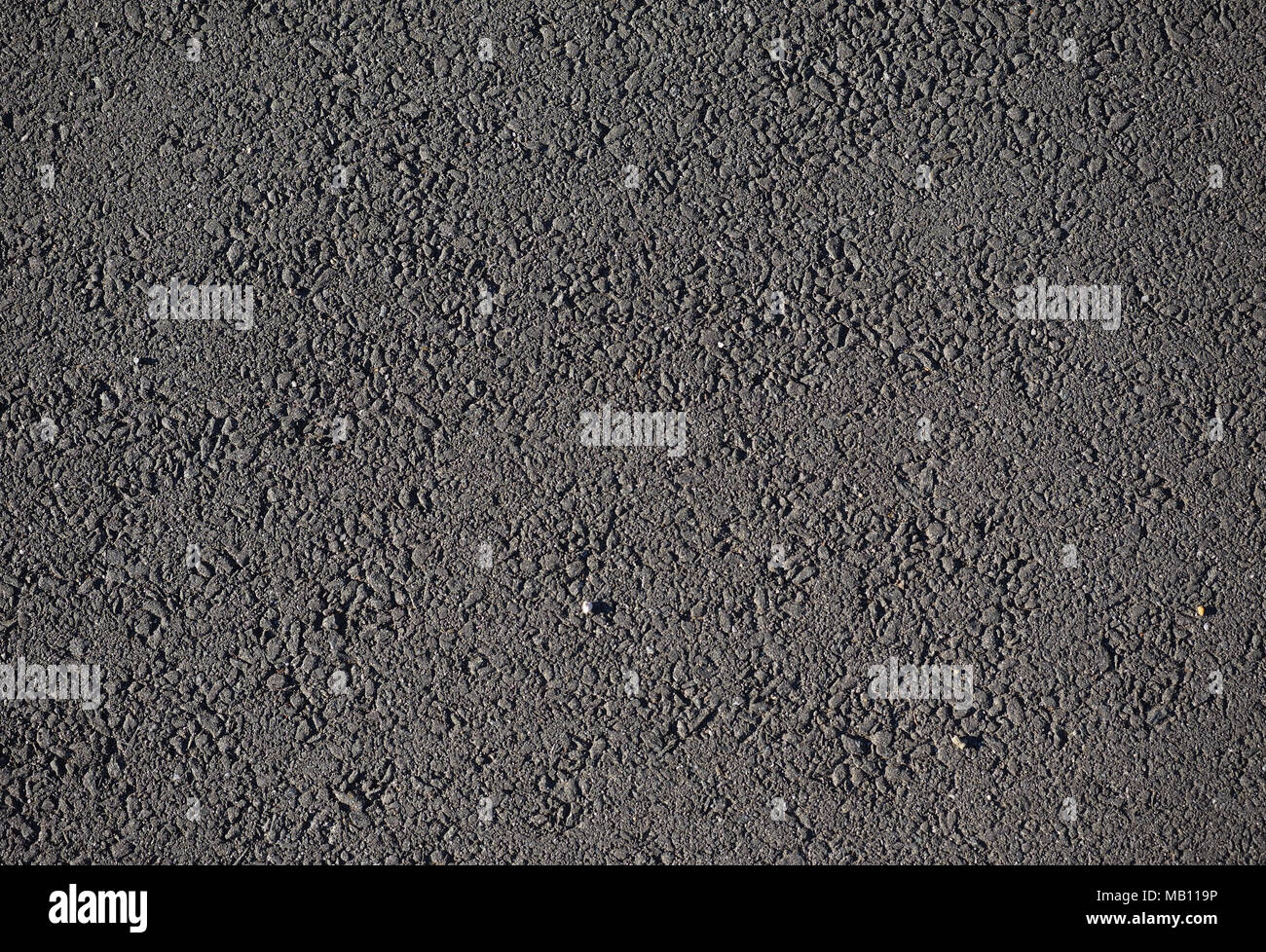 black tarmac texture useful as a background Stock Photo - Alamy