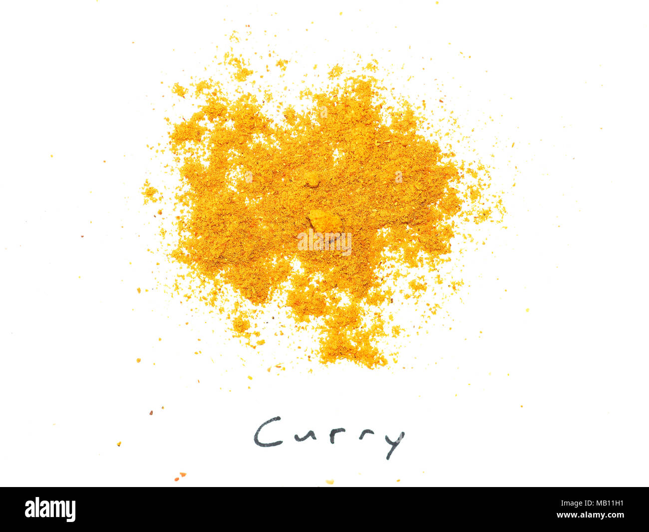 Curry powder is a blend of hot Indian spices over white background ...