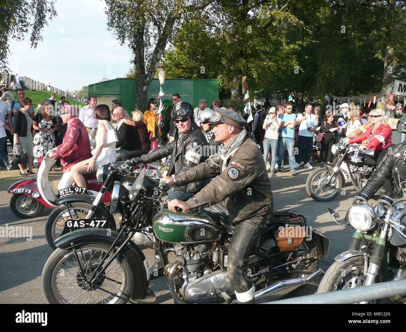 Motorcycle riders dressed in period outfits from the 1950's take part ...