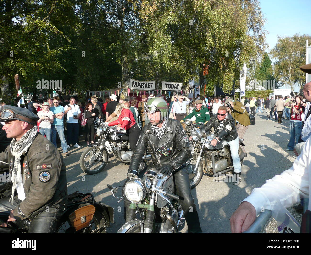 Motorcycle riders dressed in period outfits from the 1950's take part ...