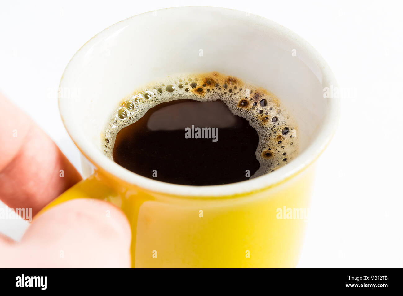 Hand with a coffee cup Stock Photo - Alamy