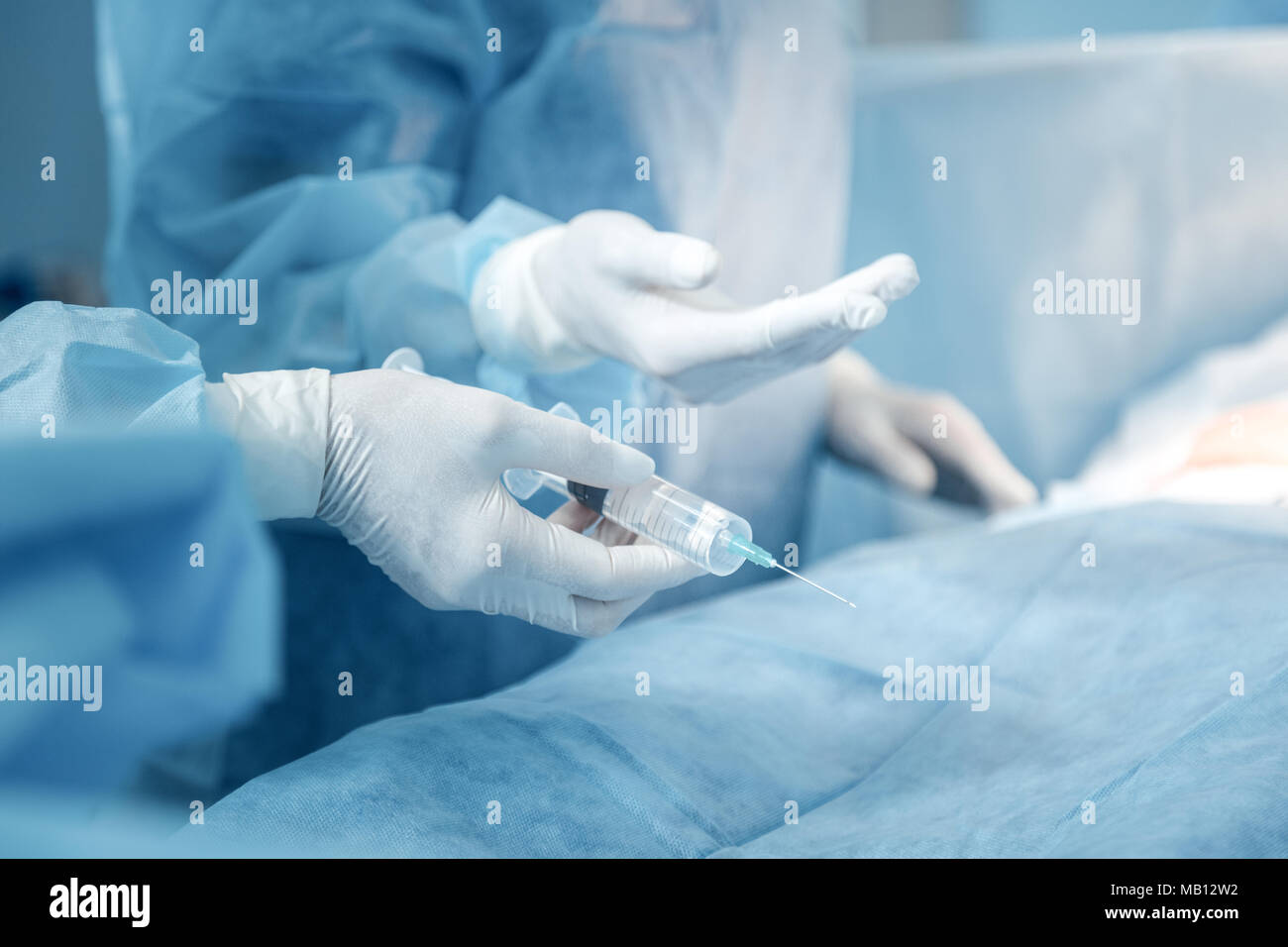 Syringe hospital operation hi-res stock photography and images - Alamy