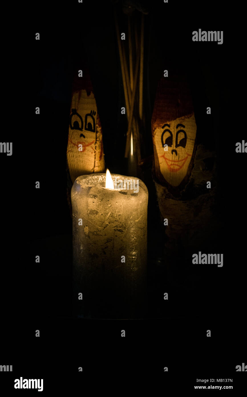 wooden dwarf in candle light Stock Photo - Alamy