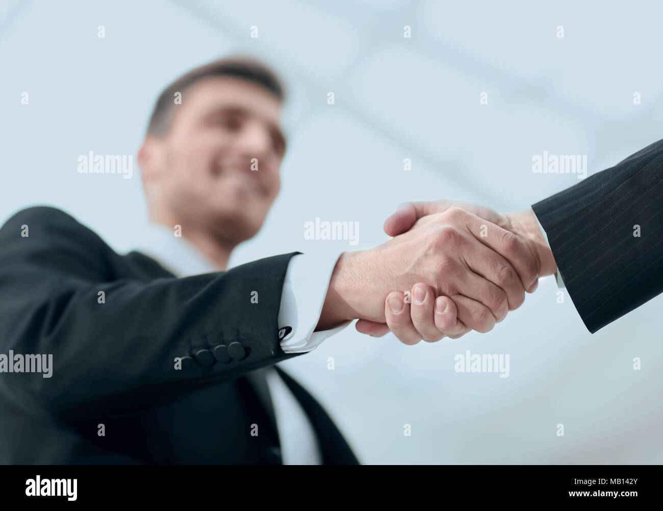 closeup handshake proven business partners. business background Stock ...