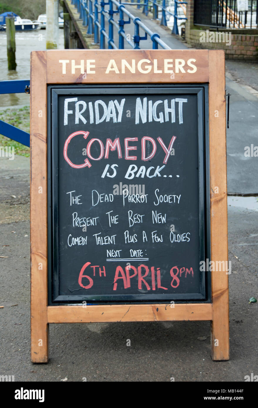 information board advertising a friday comedy night at the anglers pub ...