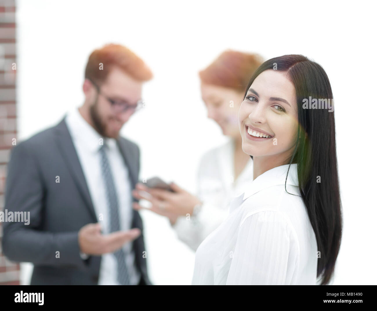 beautiful woman manager and co-workers in the office. photo has a blank ...