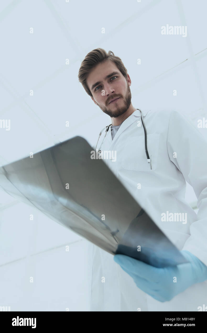 closeup.the doctor radiologist with x-ray .man.photo with copy space ...