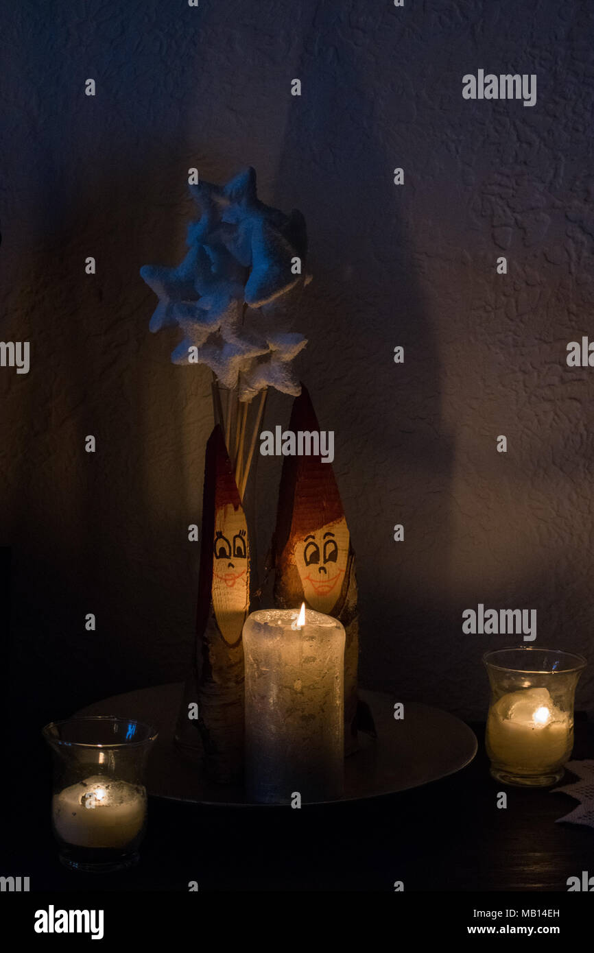wooden dwarf in candle light Stock Photo - Alamy