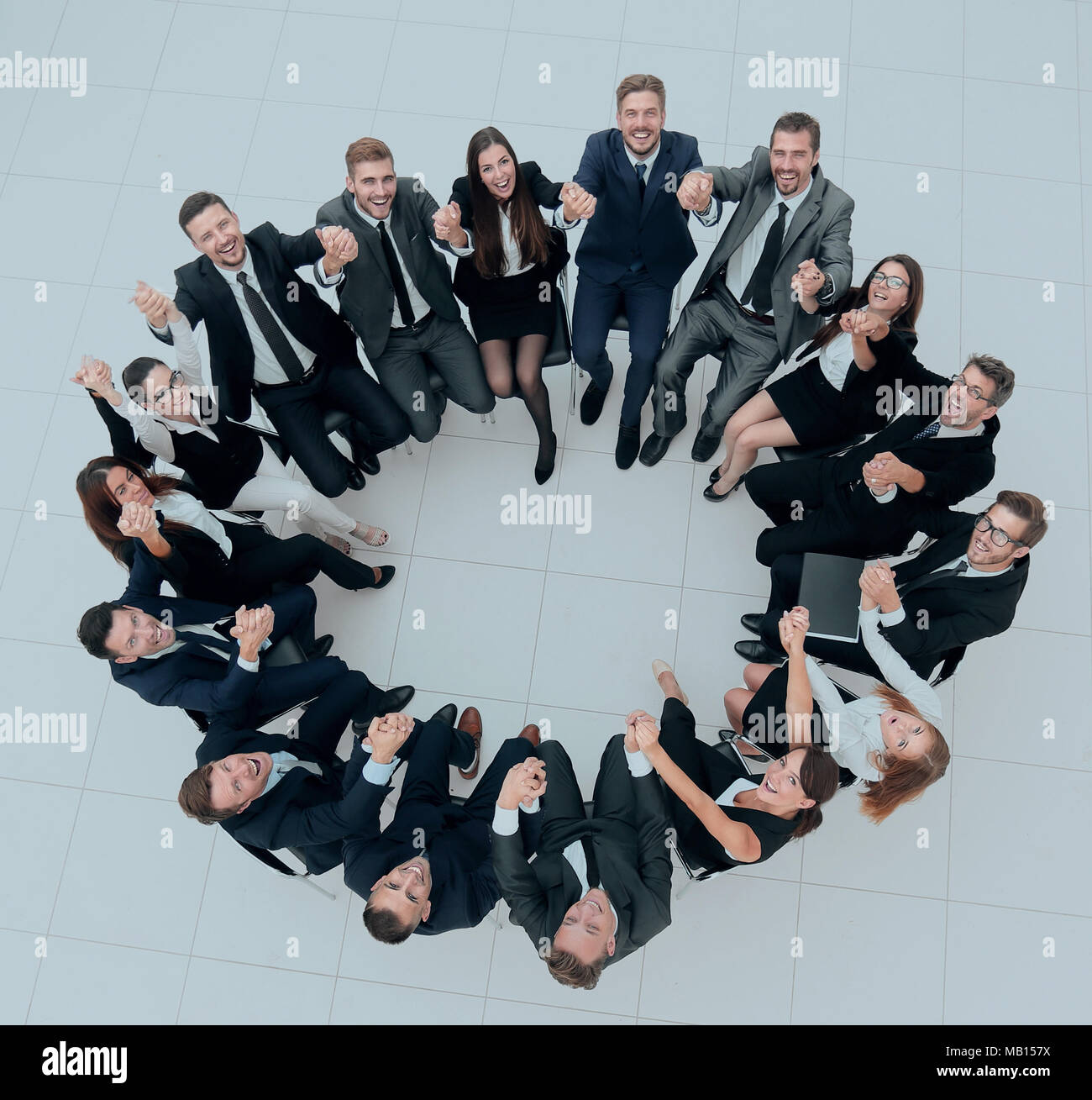 concept of team building .large successful business team sitting in a ...