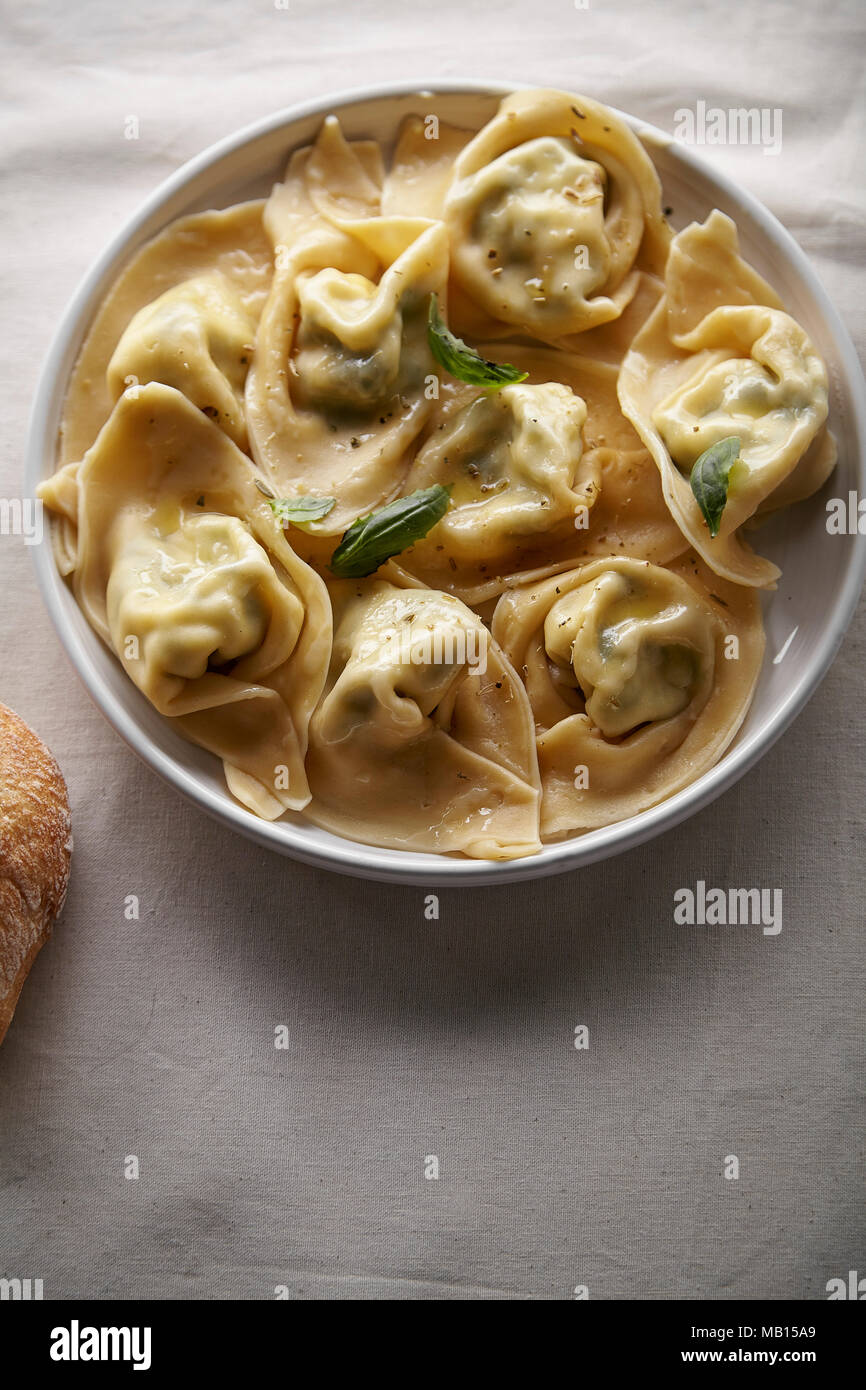 Traditional italian handmade ravioli with ricotta cheese and spinach on ...