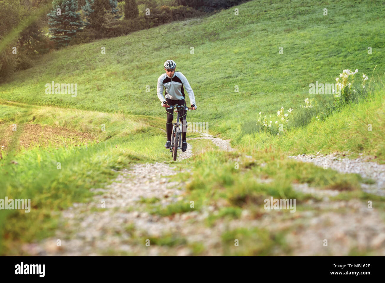 Green cyclist hi-res stock photography and images - Alamy