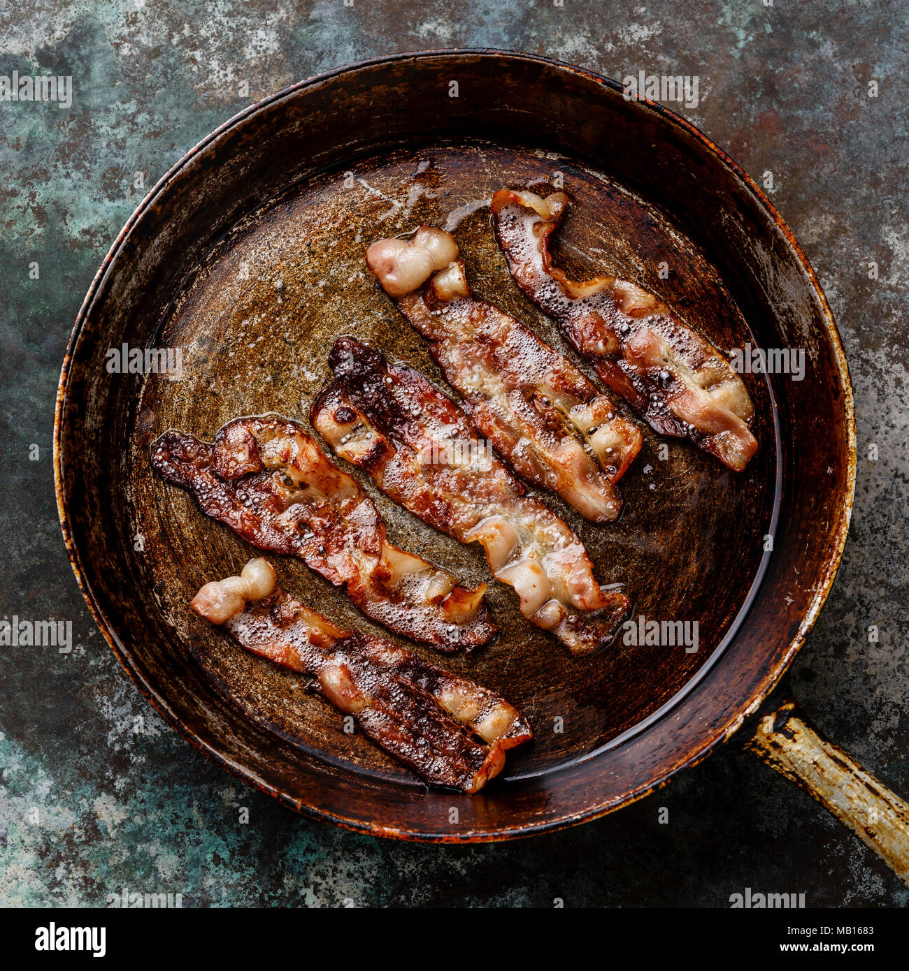 Fry bacon in pan slice hi-res stock photography and images - Alamy