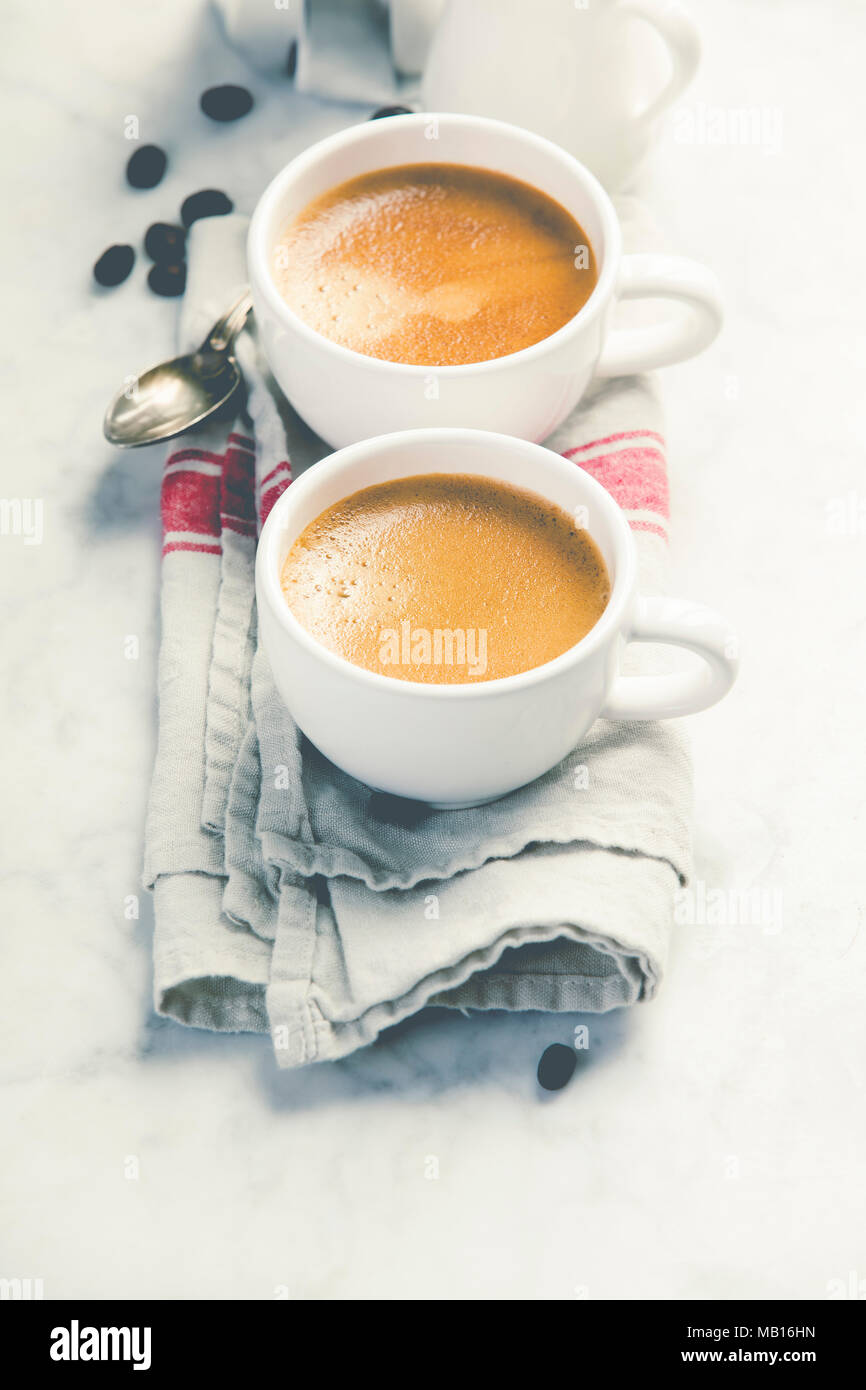 Coffee composition on white marble background Stock Photo - Alamy