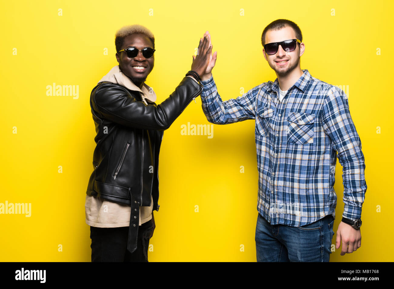 Friends high five hand shake hi-res stock photography and images - Alamy