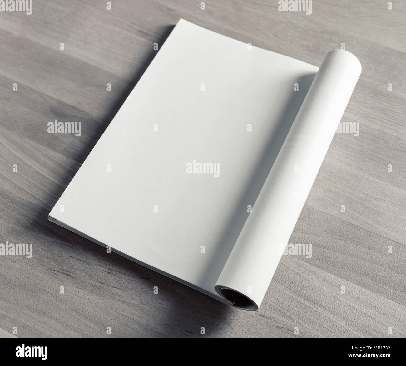 Blank magazine or brochure on wood table background Stock Photo - Alamy