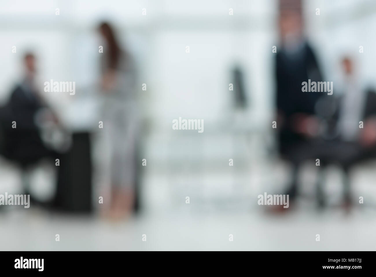 defocused photo of people working in office Stock Photo - Alamy