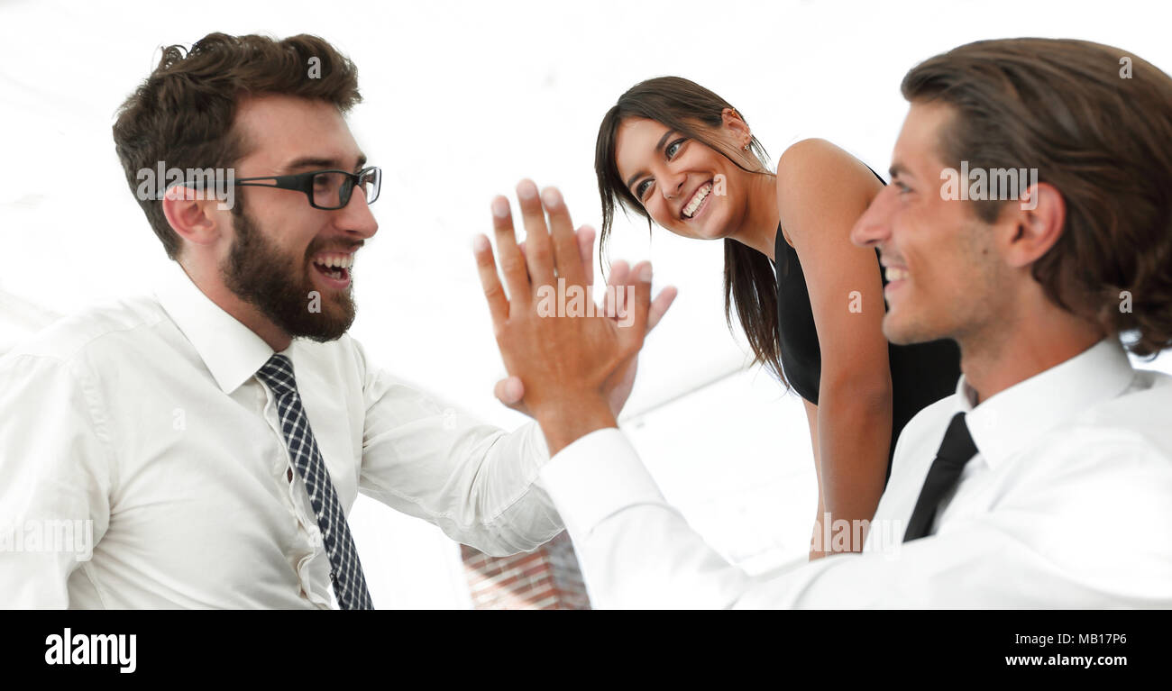 business colleagues giving each other high five Stock Photo - Alamy