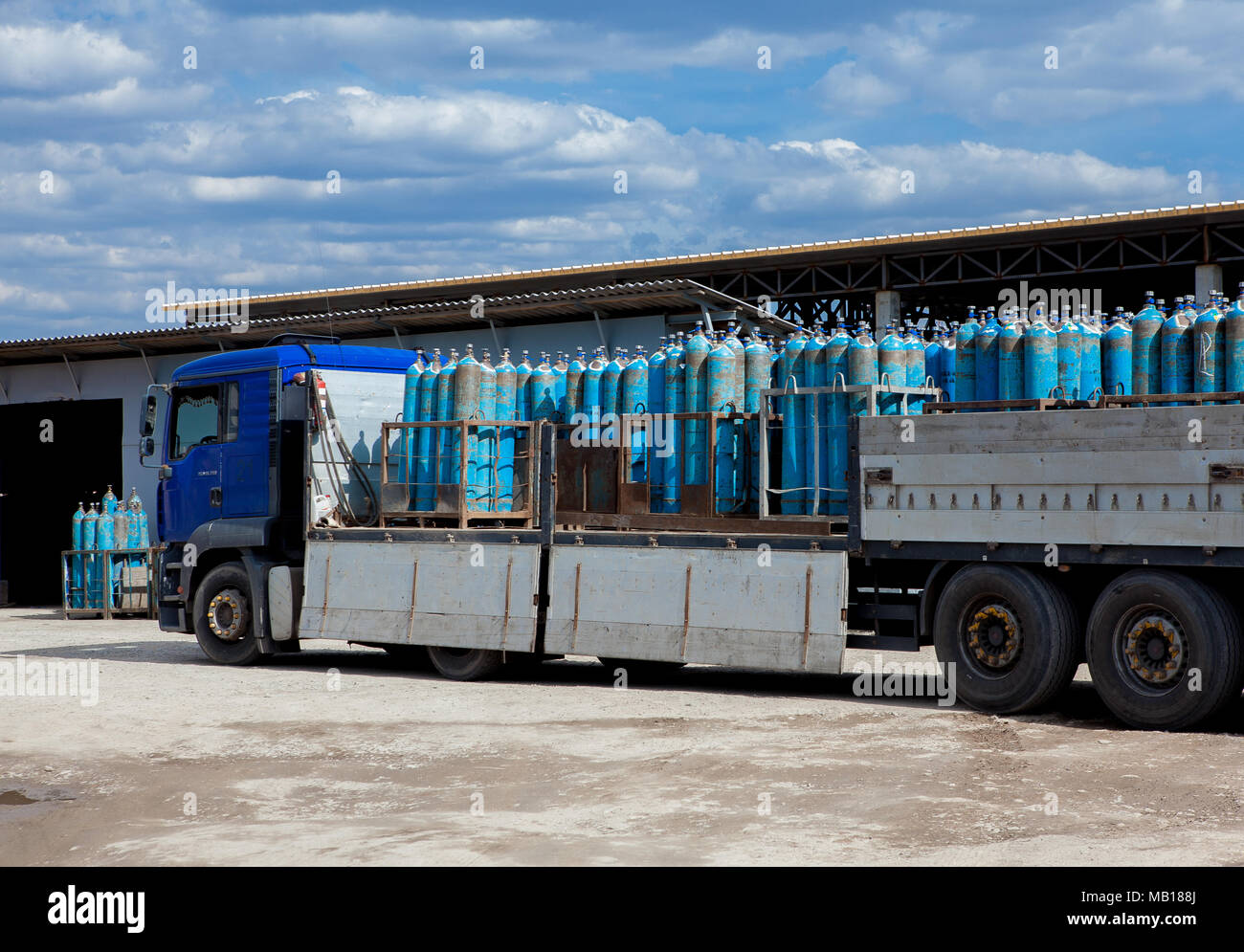 Truck for transportation of gas cylinders. The car delivers gas to the ...