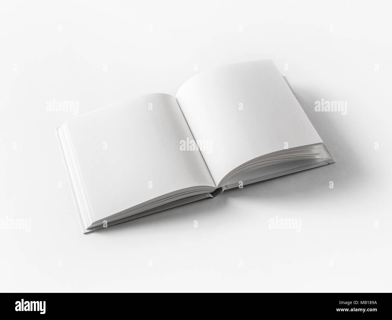 Blank open book on white paper background Stock Photo - Alamy