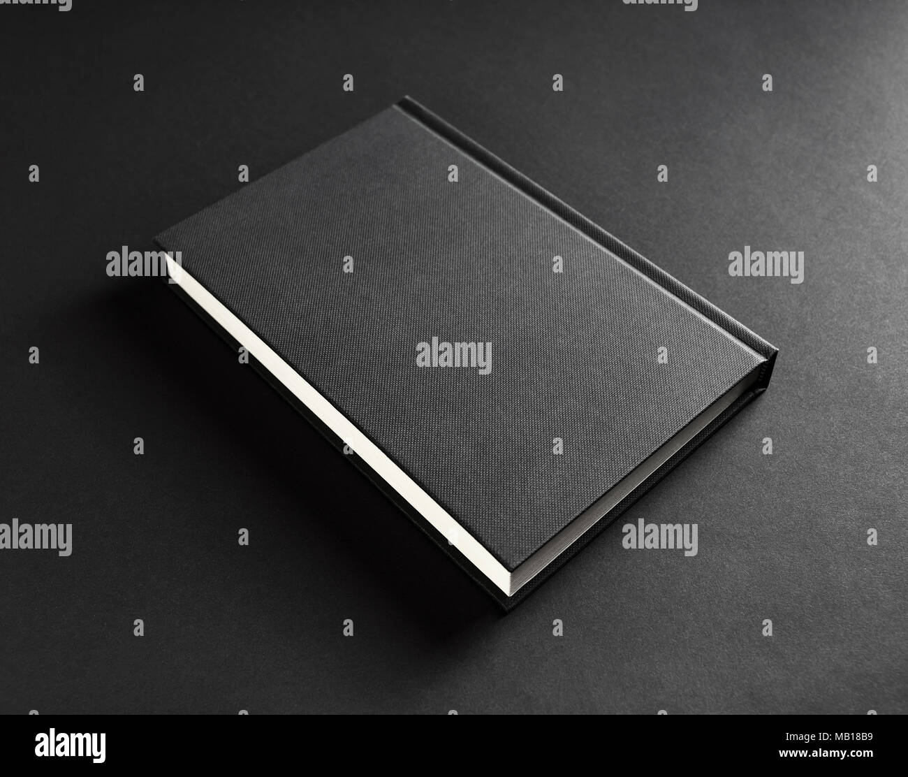 Photo of blank black book cover on black paper background Stock Photo ...