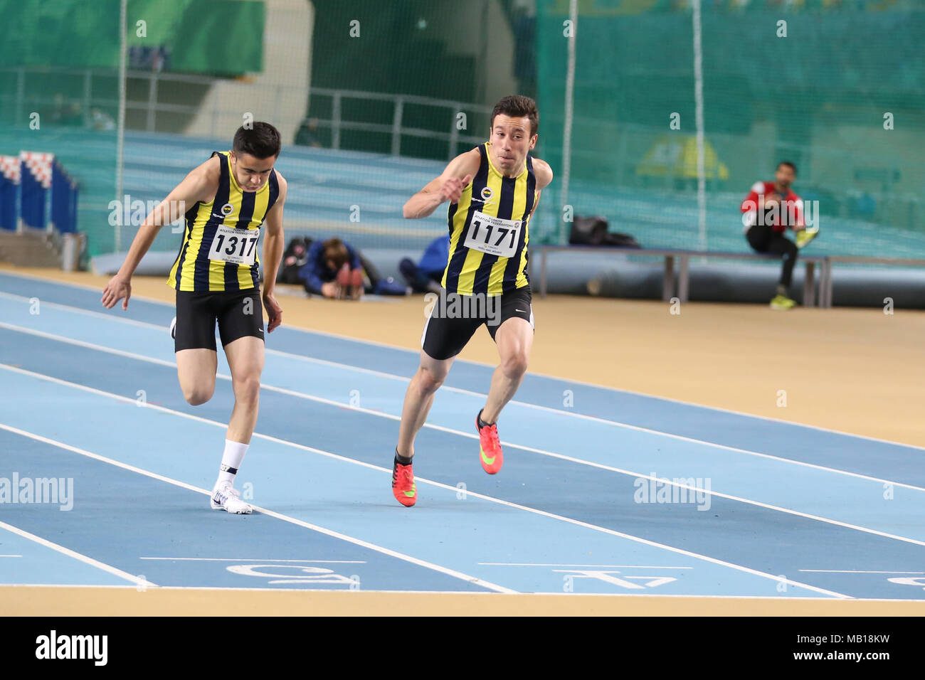 ISTANBUL, TURKEY - DECEMBER 23, 2017: Athletes running 60 meters during ...