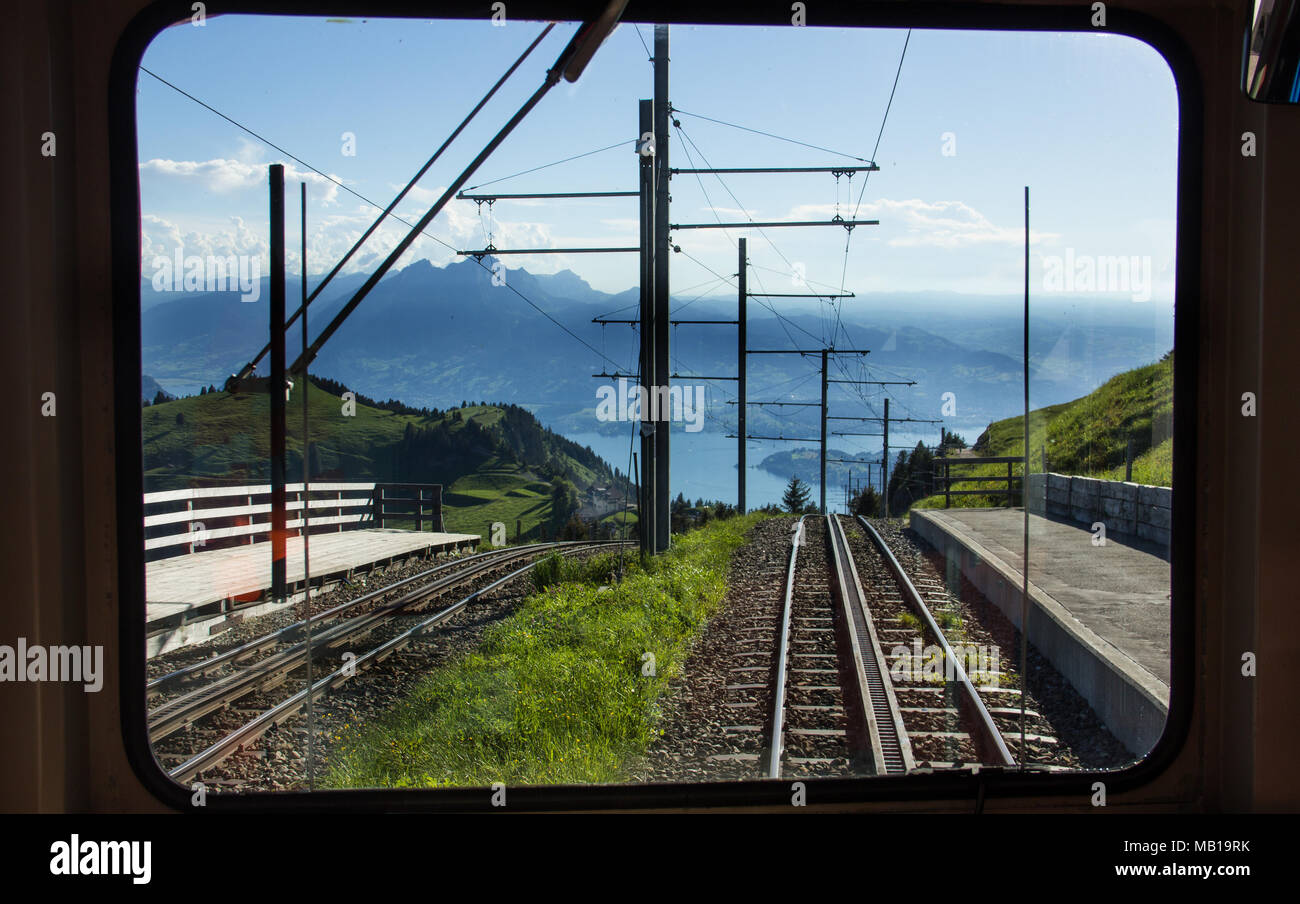 cogwheel train window view of railway track down Rigi Kulm Station ...