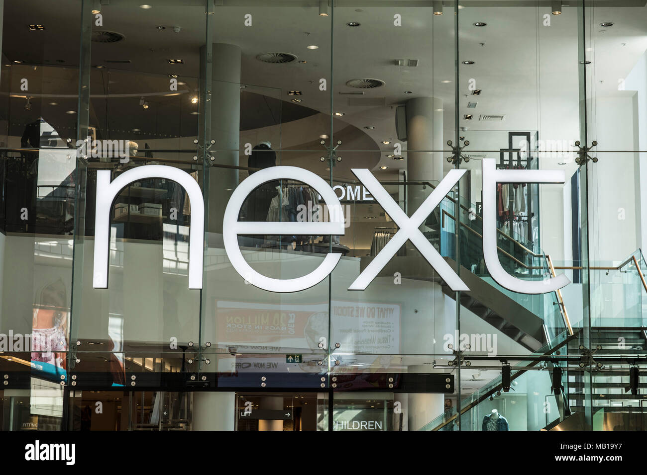 Next clothing logo clothes shop store uk sign hi-res stock photography ...