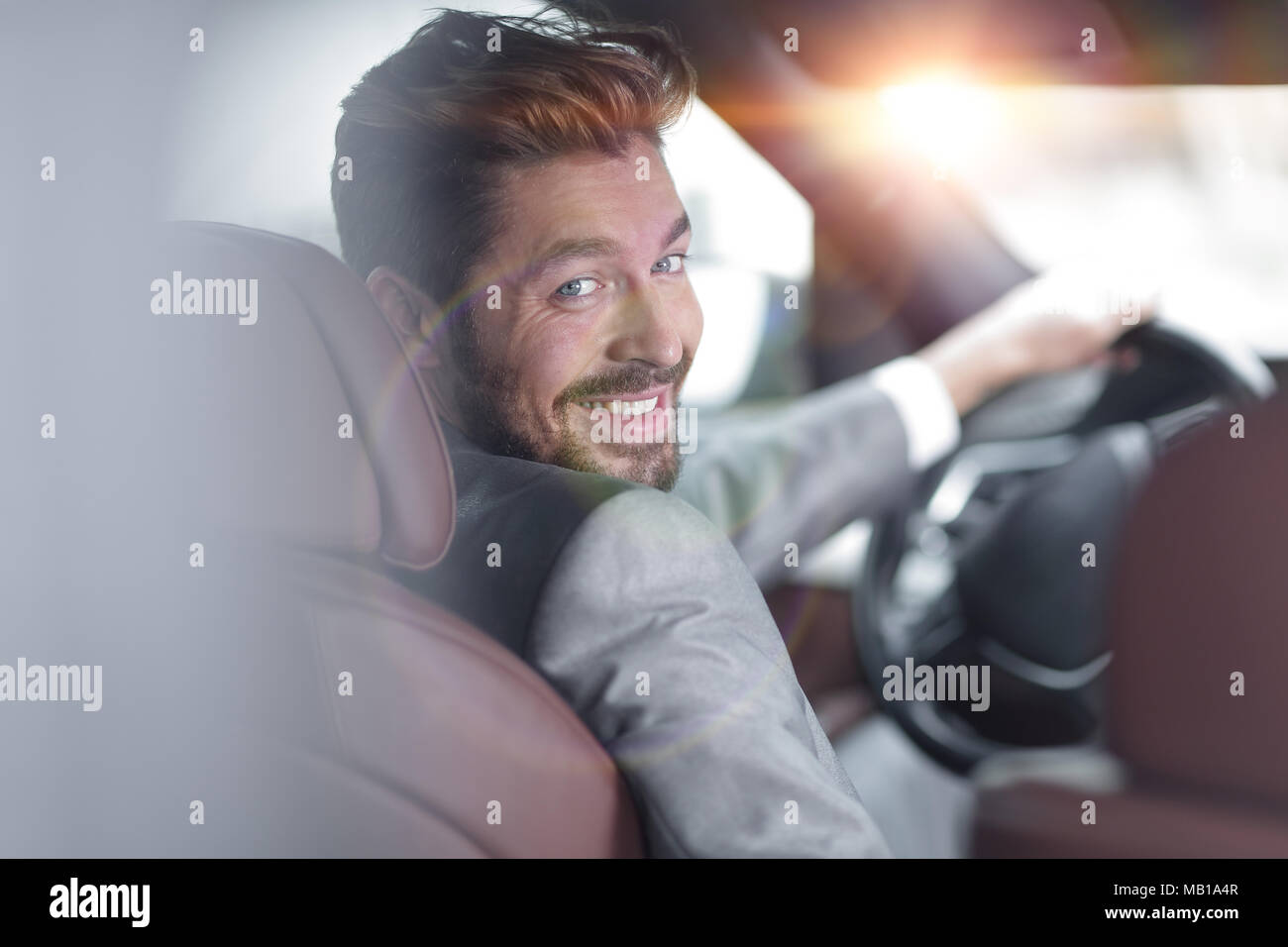 The young man behind the wheel Stock Photo - Alamy