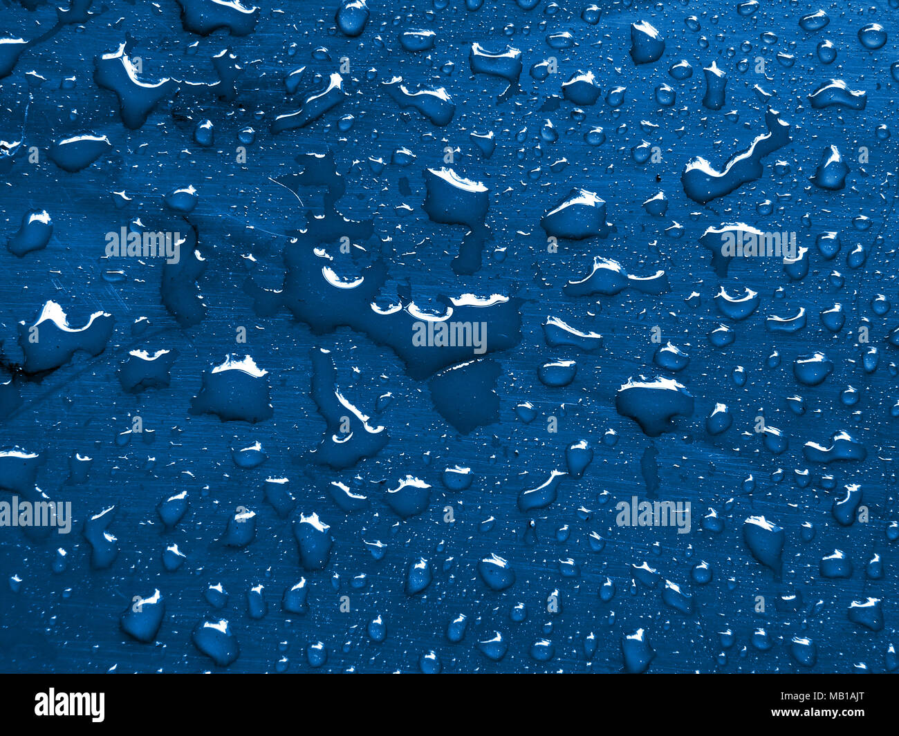 Blue water drops close hi-res stock photography and images - Alamy