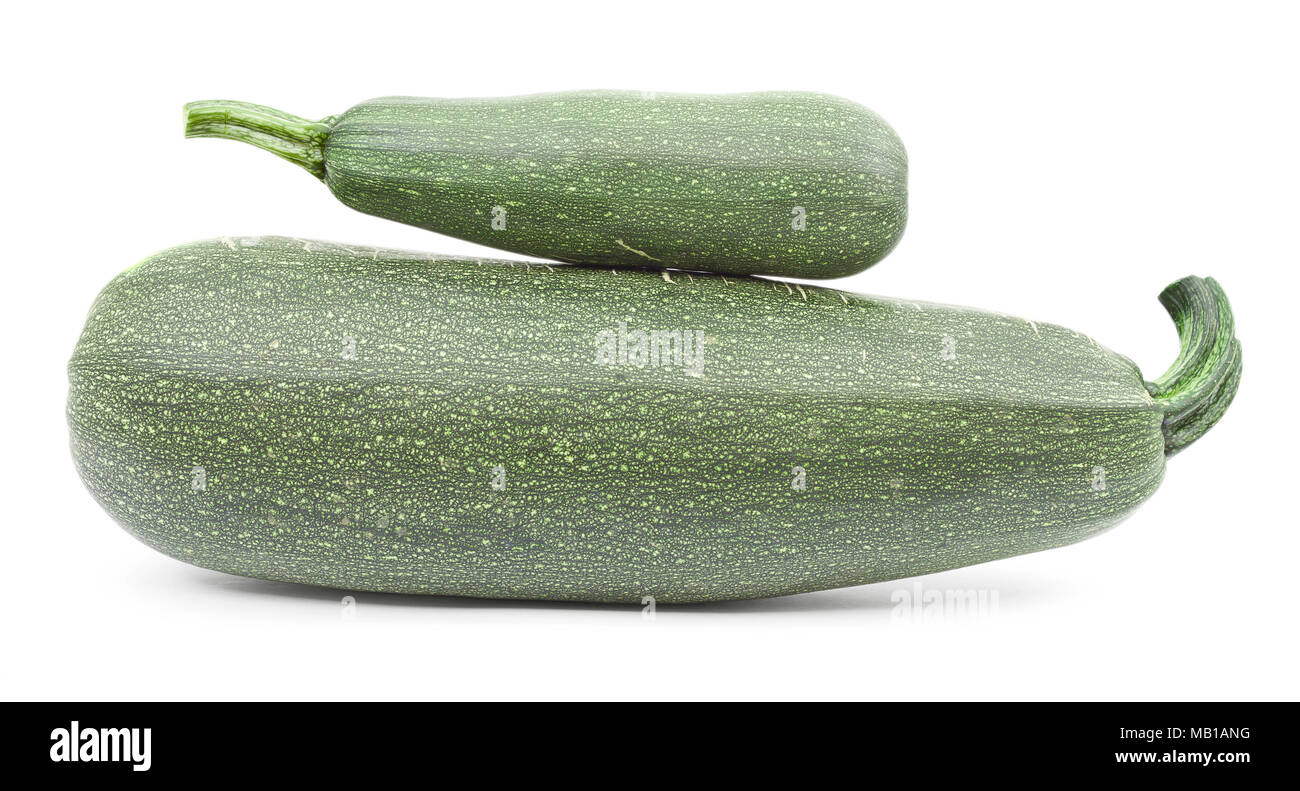 Two large courgettes on a white background Stock Photo - Alamy