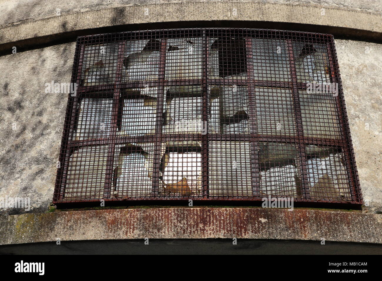 Broken window glass, barred Stock Photo - Alamy