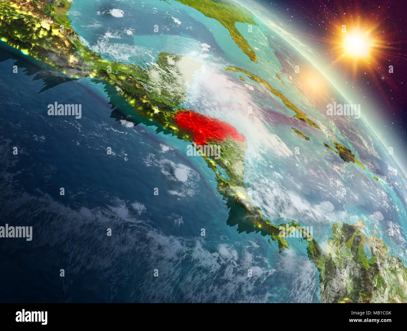 Sunrise above Honduras highlighted in red on model of planet Earth in ...