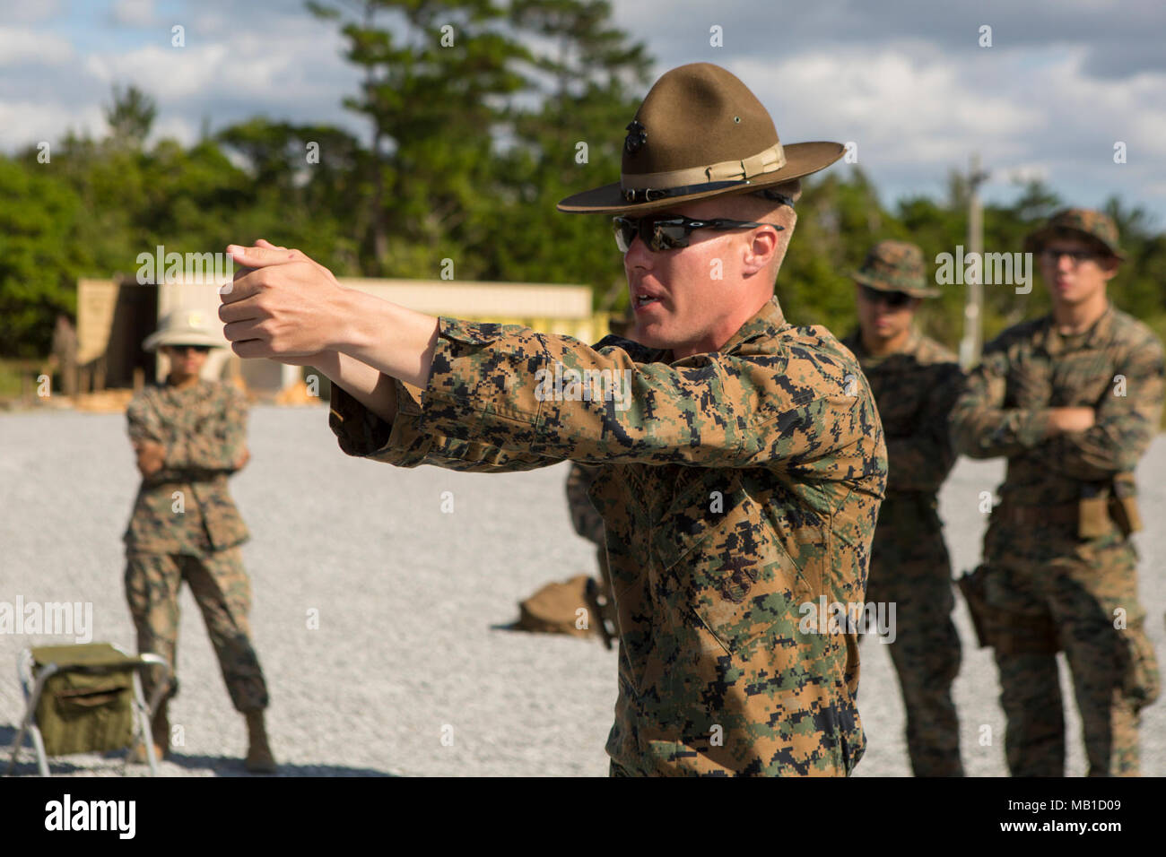CAMP HANSEN, OKINAWA, Japan— Cpl. Cameron Patrick demonstrates proper ...