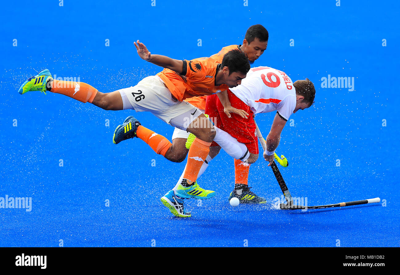 Malaysia's Shahril Saabah (left) and England's David Goodfield battle ...
