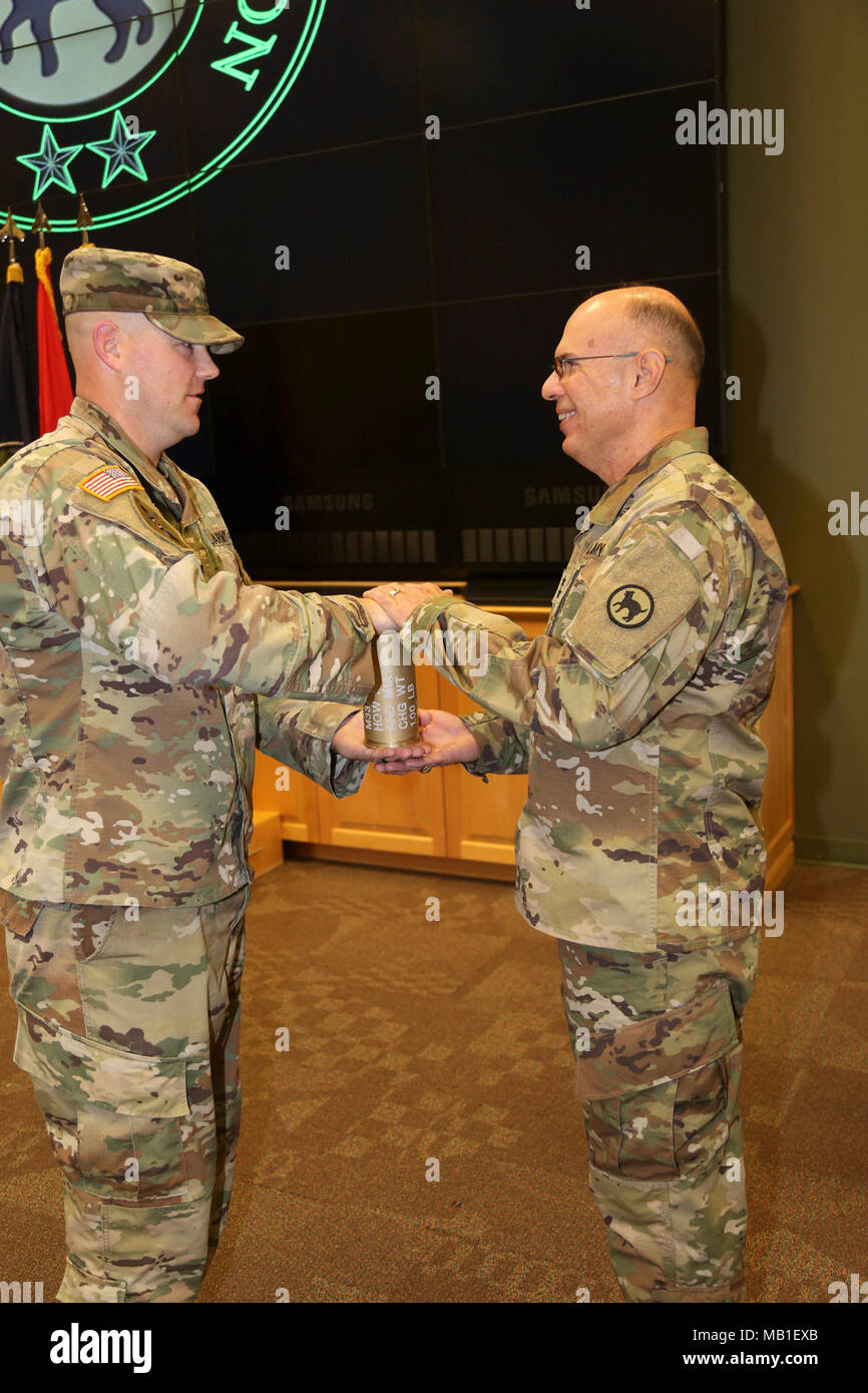 Maj. Gen. Kenneth Jones receives the “Ceremonial Last Shell Fired” from ...