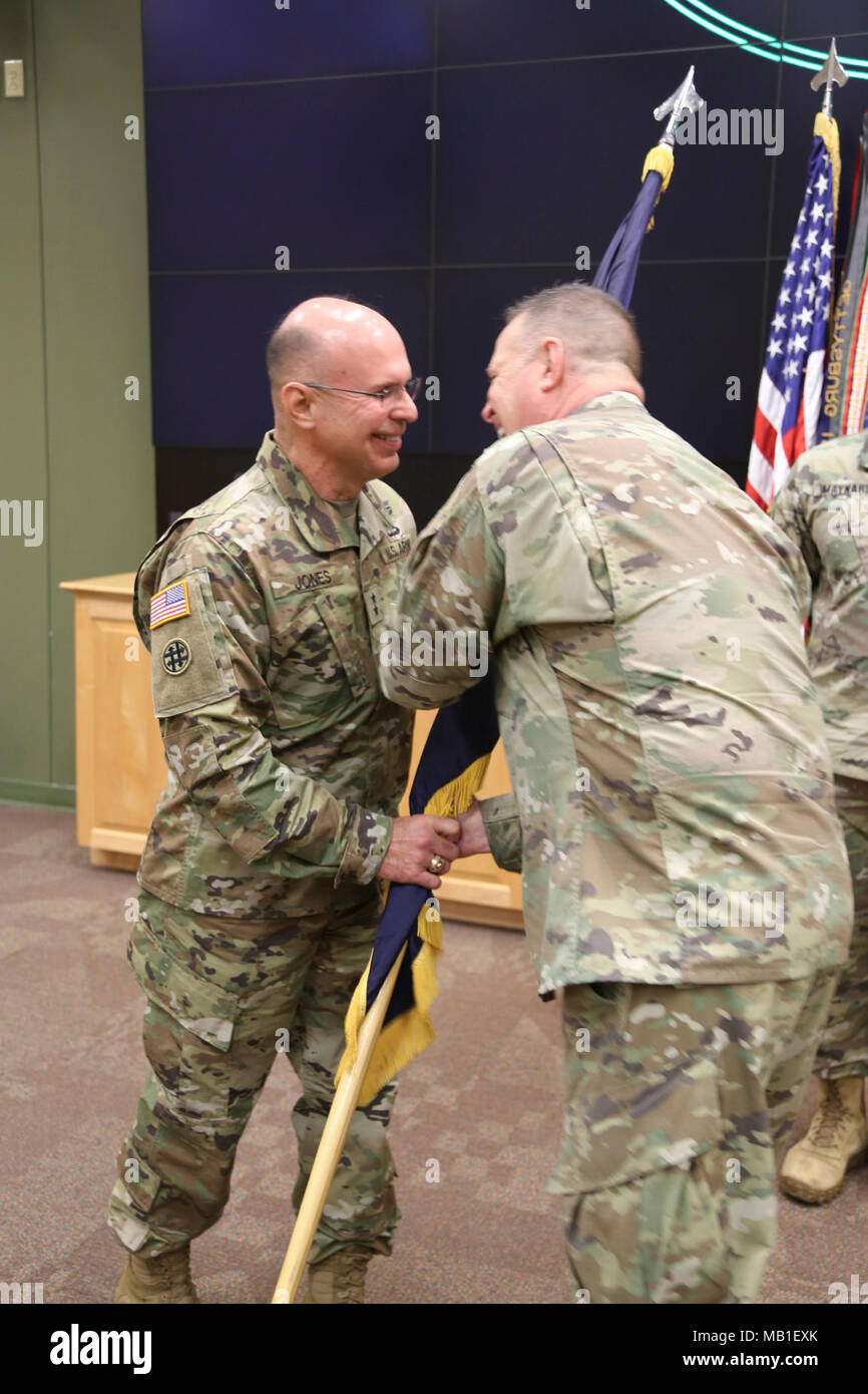 Maj. Gen. Kenneth Jones receives the flag from Maj. Gen. Scottie ...