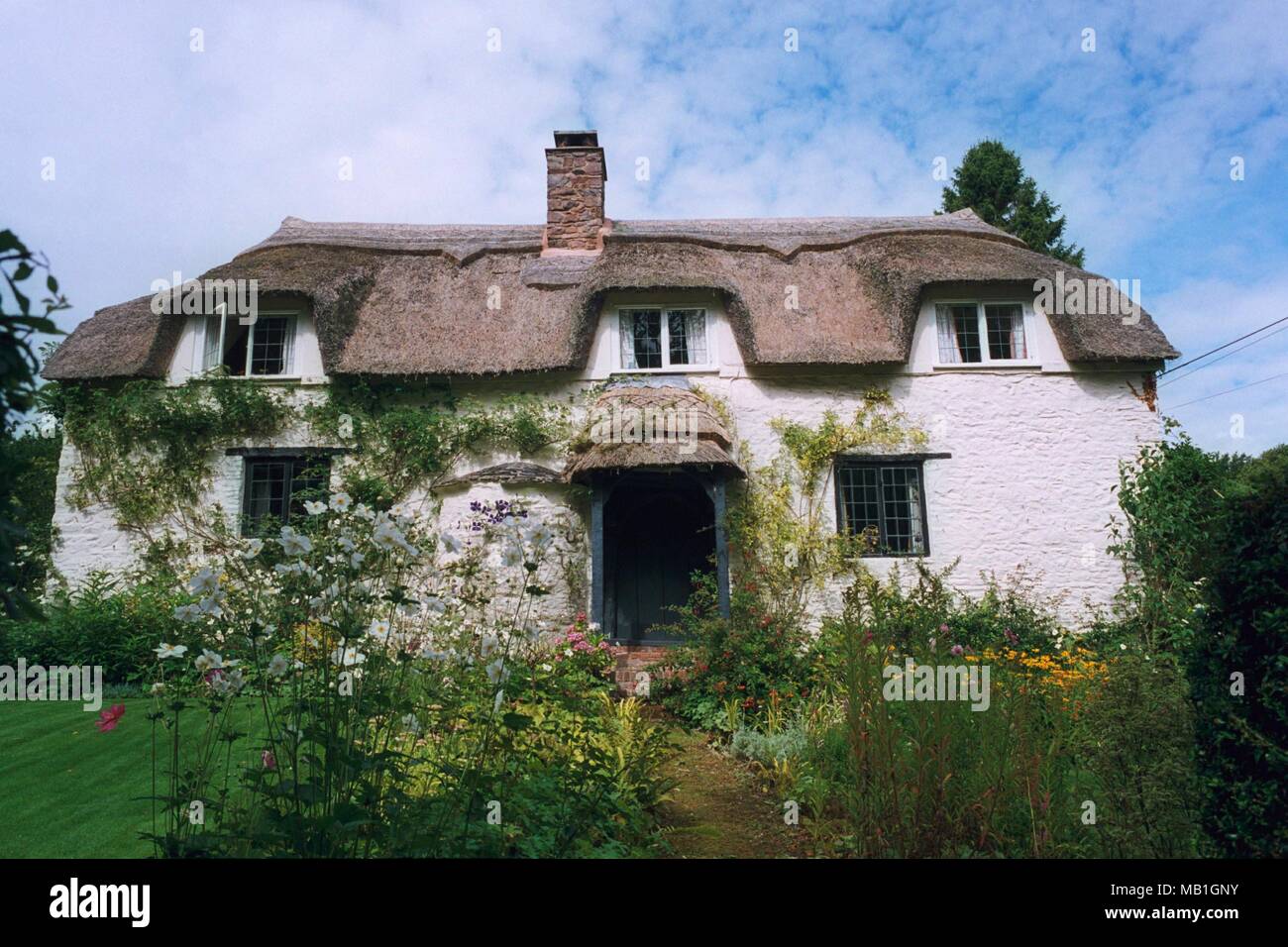 Typical country house with thatched roof hi-res stock photography and ...